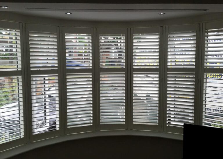 What Is the Difference between Blinds and Plantation Shutters? - Bullet Garage Doors